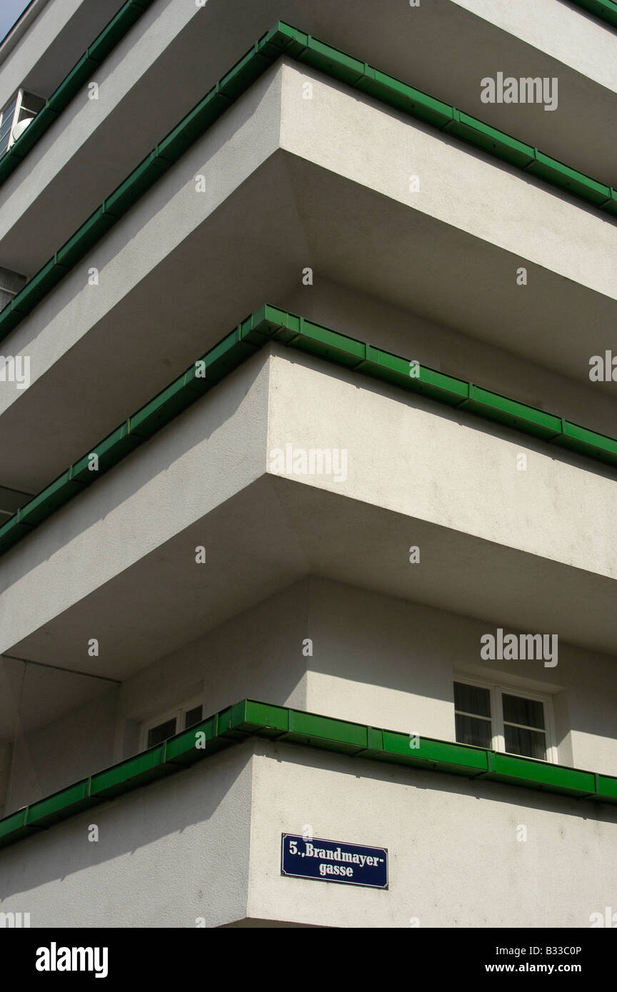 Balcony front of community-subsidized tenement building Stock Photo - Alamy