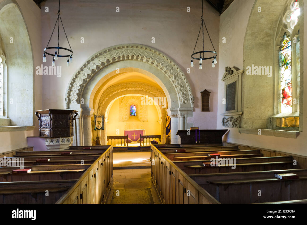 The wonderful Norman chancel arch in St Johns church in the Cotswold ...