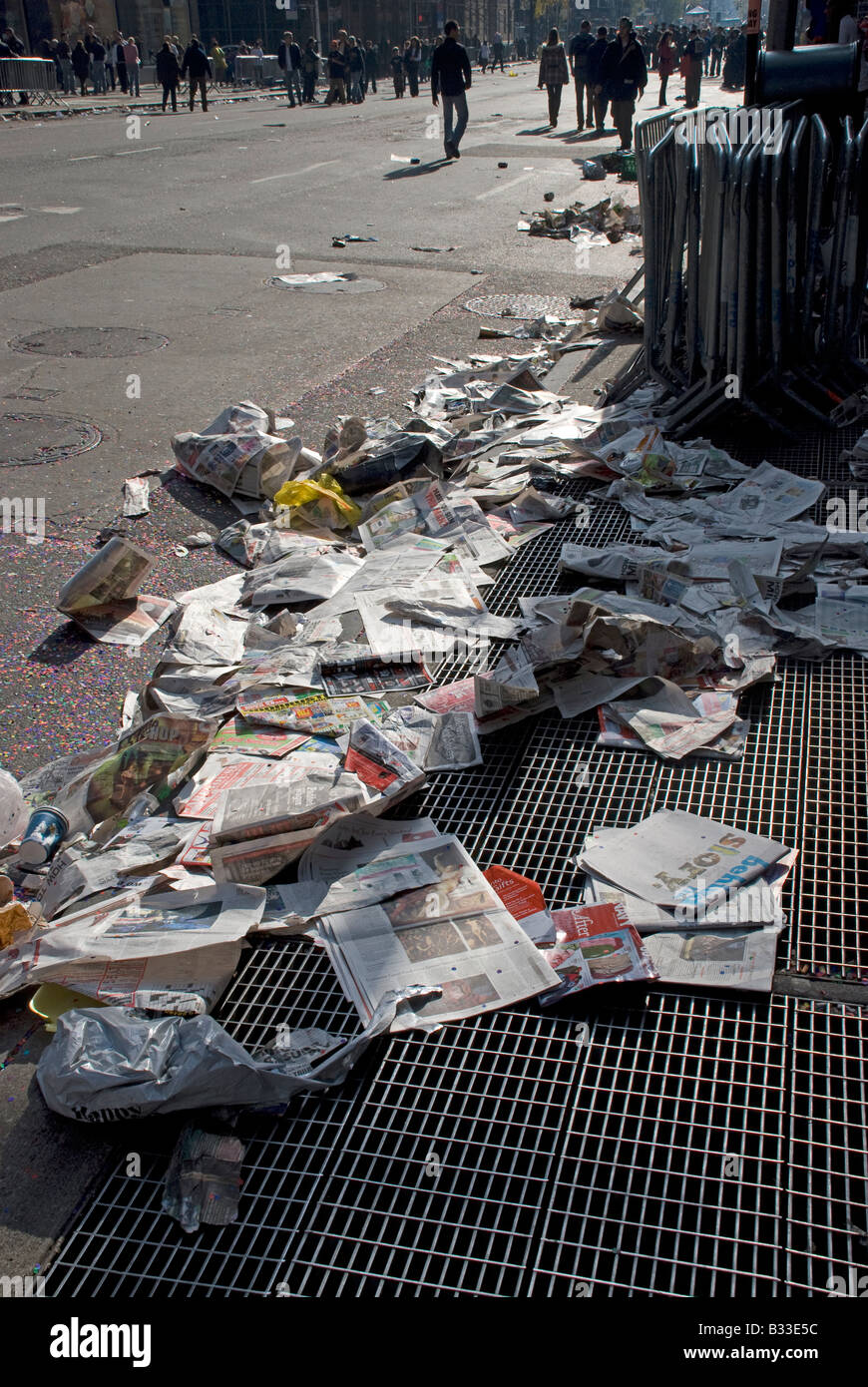 People leaving after the parade confetti old news trash afternoon New ...