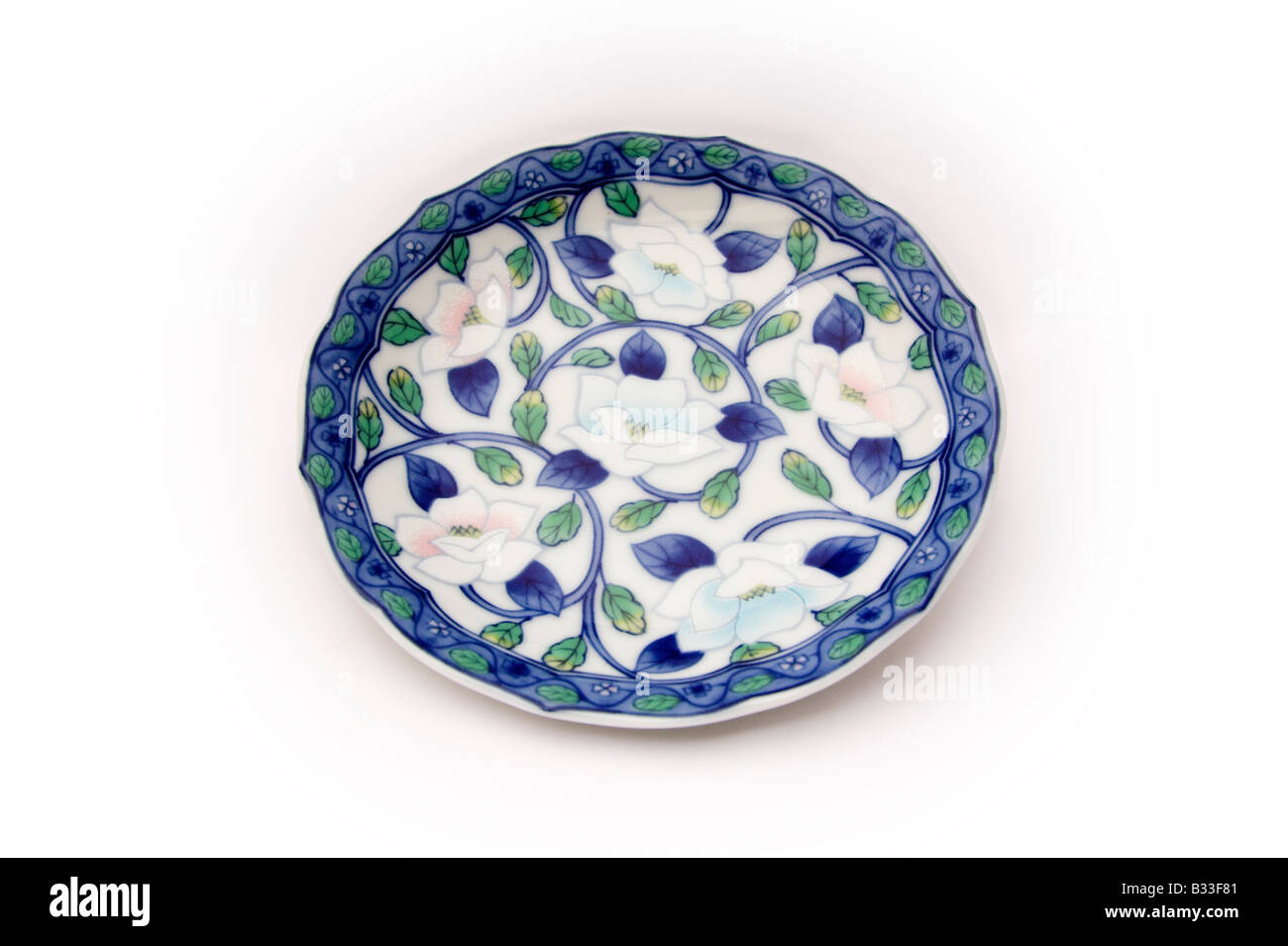 Blue and white patterned porcelain dish, white background Stock Photo ...