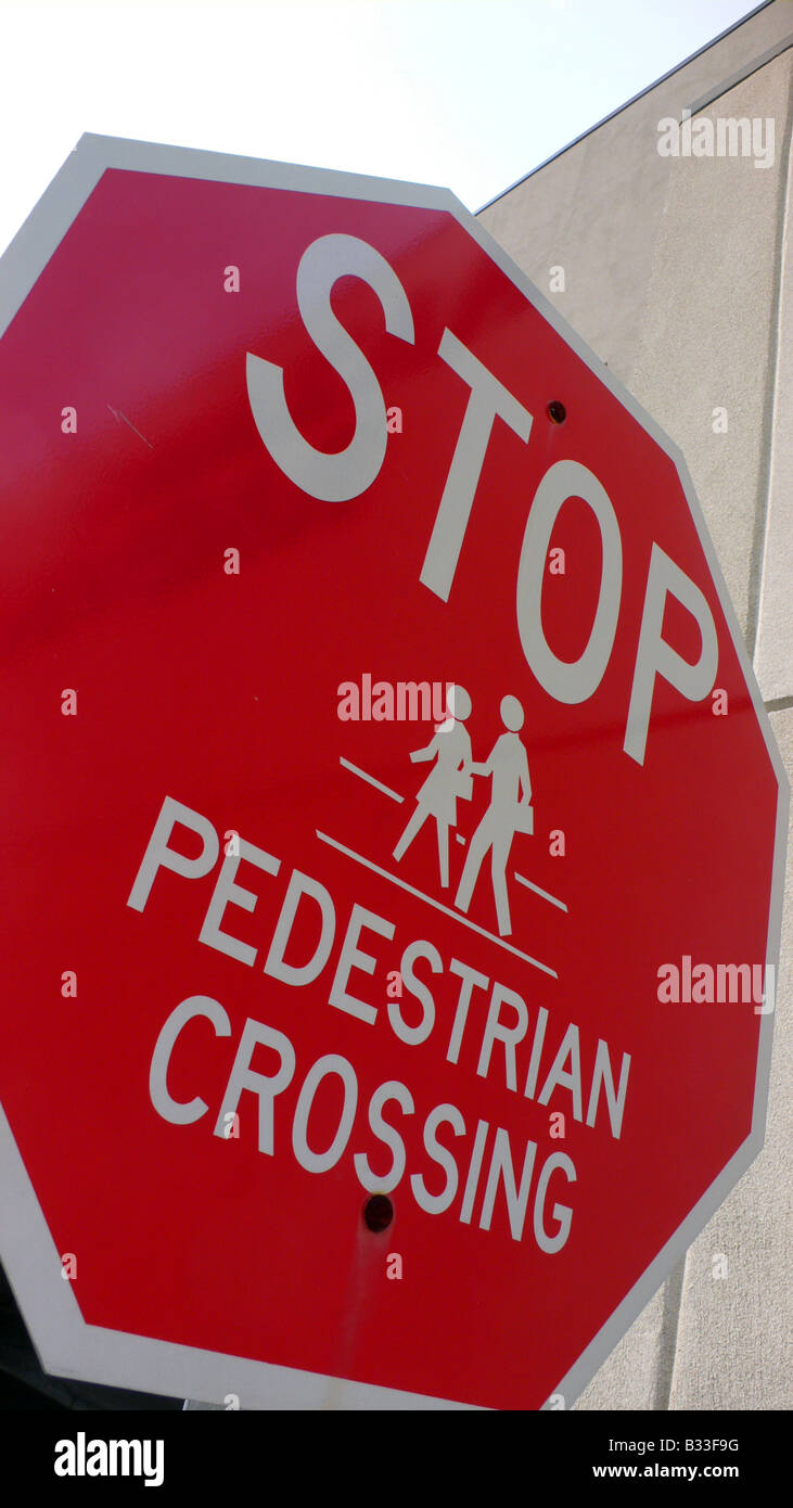 Stop sign, pedestrian crossing Stock Photo - Alamy