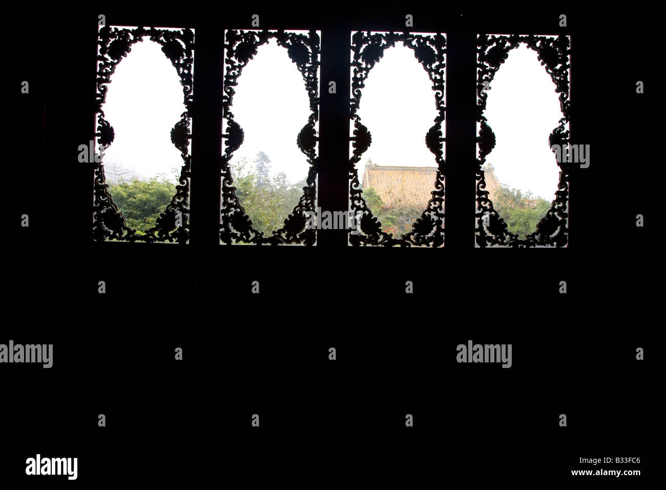 Decorative window in Buddhist temple Stock Photo - Alamy