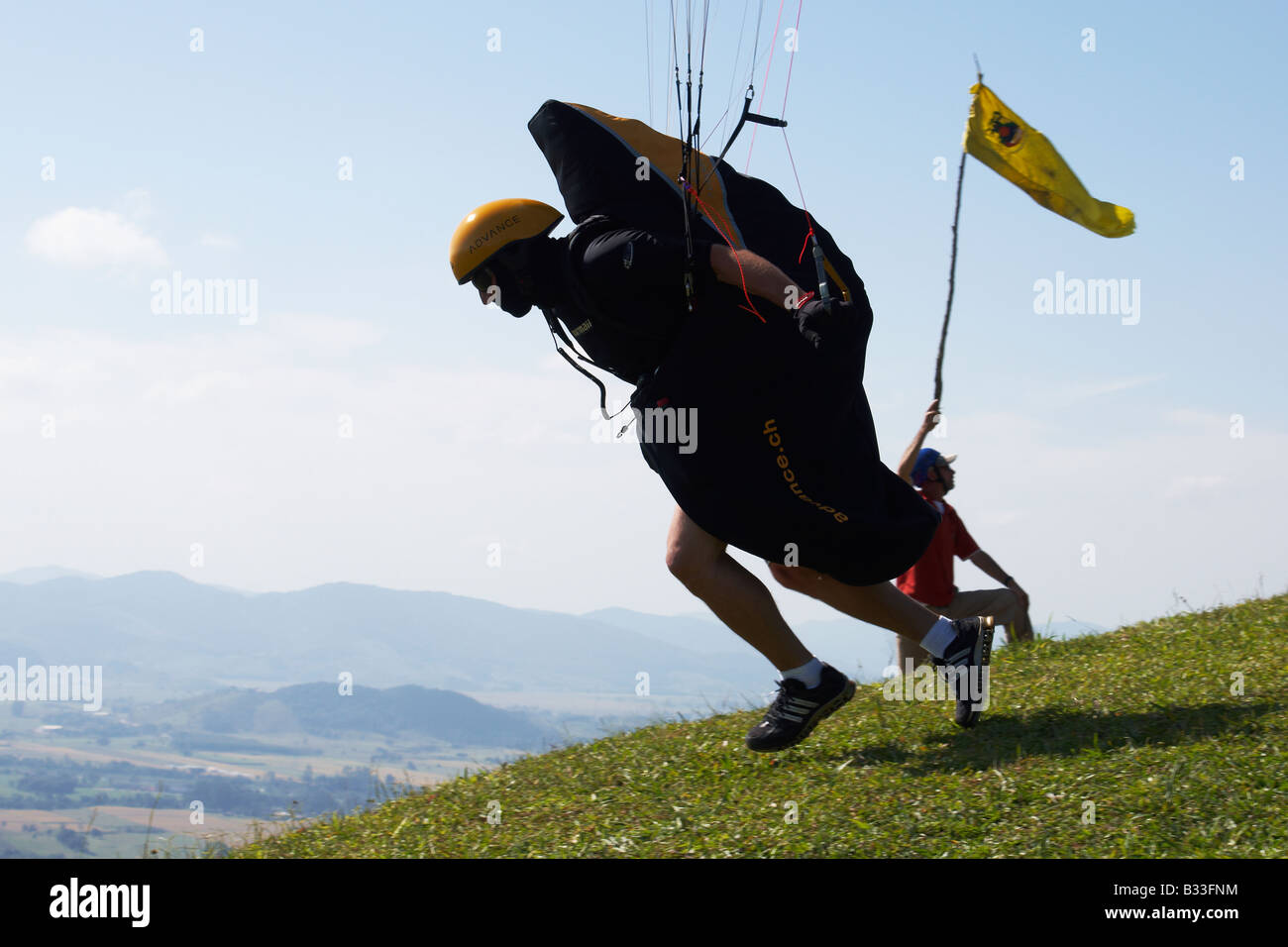 Take off for a paraglider flight Stock Photo - Alamy