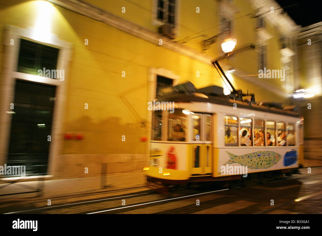 Night time fast tram hi-res stock photography and images - Alamy