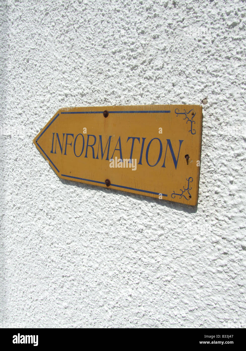 information sign on wall outdoors in sun Stock Photo - Alamy