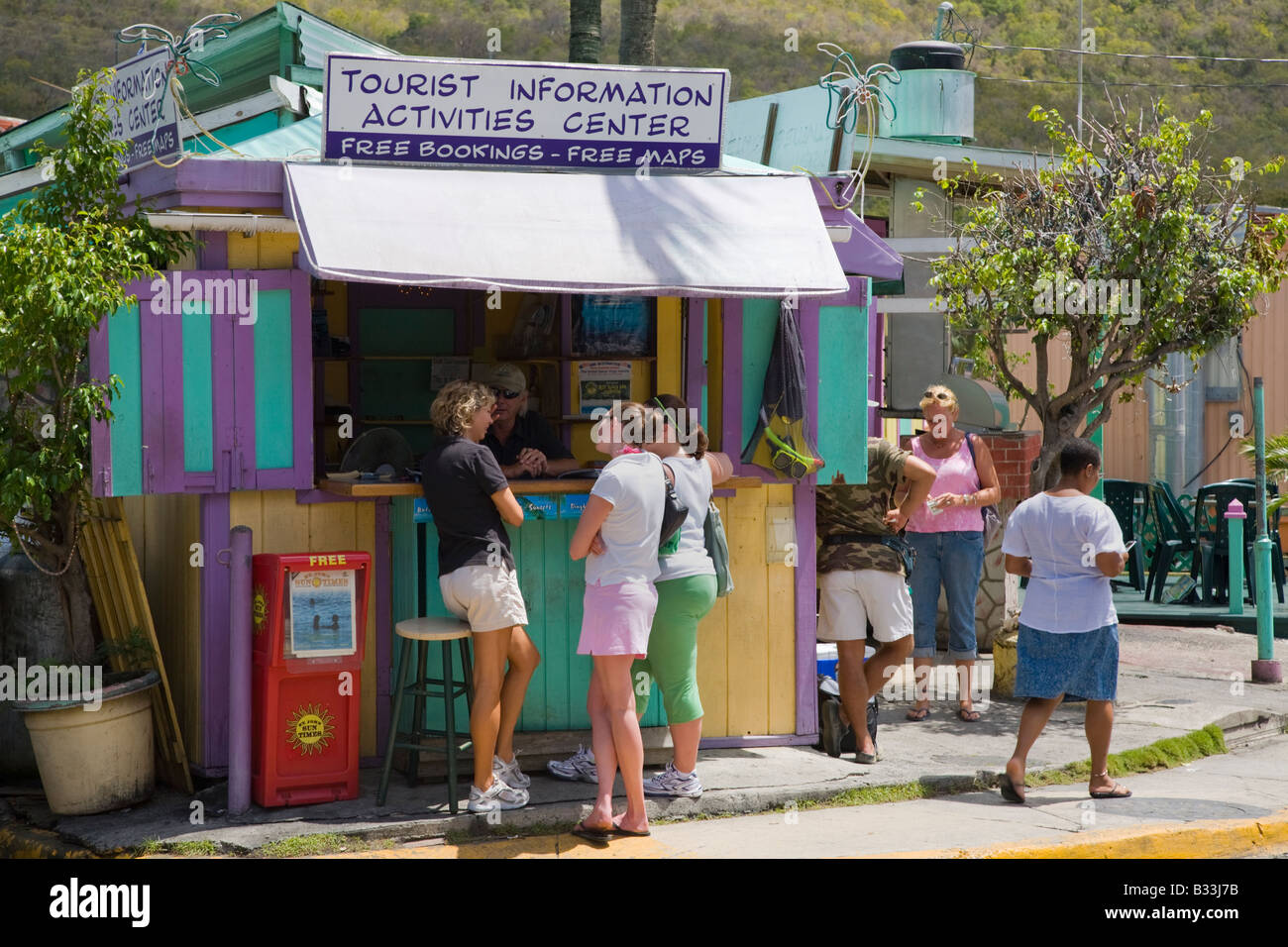 People at touist information booth in Cruz Bay on the caribbean island ...