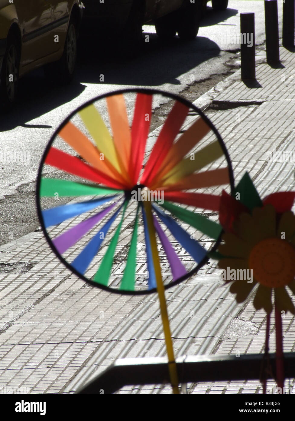 toy windmill on street in athens greece Stock Photo - Alamy