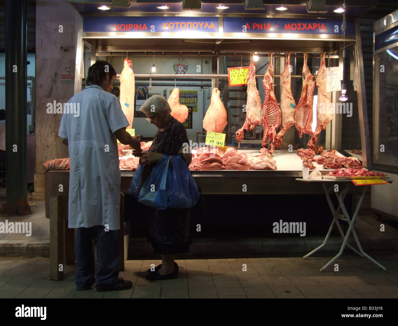 busy fresh meat market in athens greece Stock Photo - Alamy