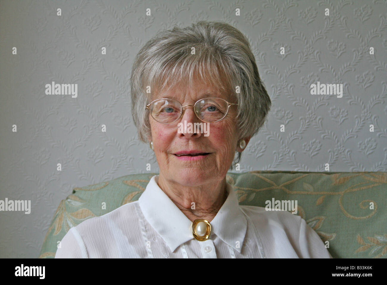 Elderly Lady looking at camera Stock Photo - Alamy