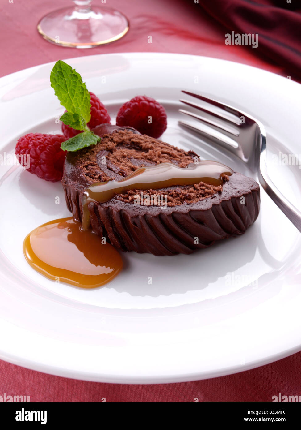 Chocolate Yule log dessert editorial food Stock Photo - Alamy
