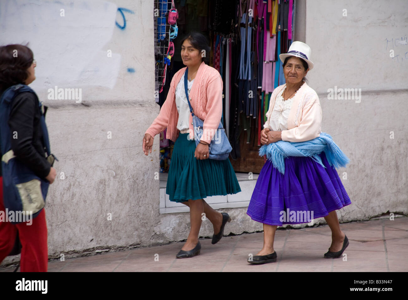 2 Women walking Cuenca street. Poncho and Hat. Ecuador South America ...