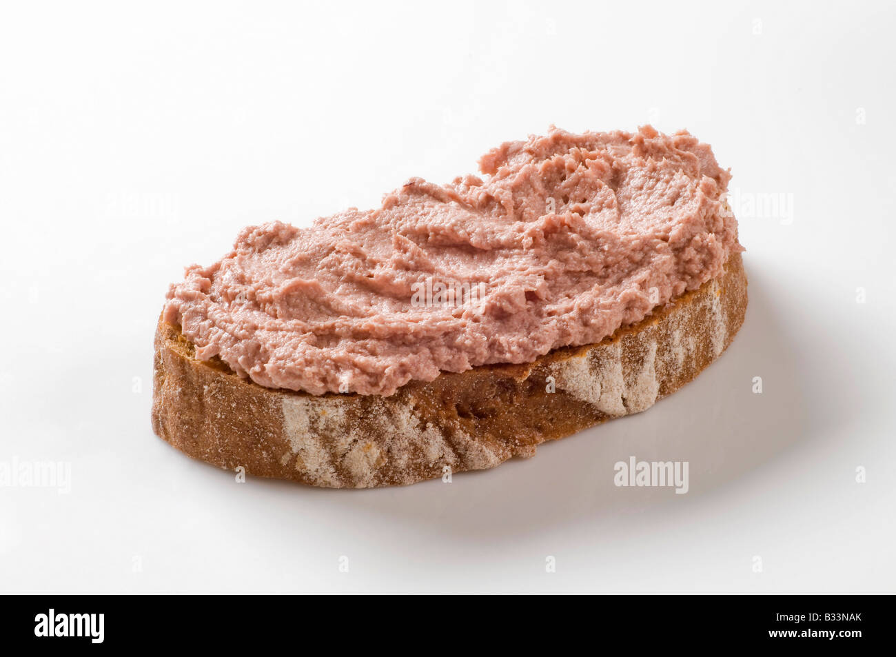 Slice of bread and liver pate Stock Photo - Alamy