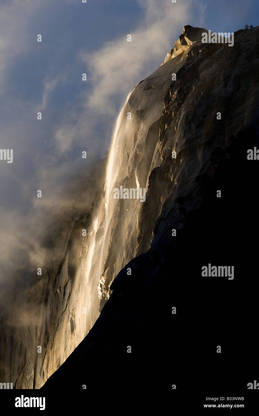 Heavy wind whips the water from Horsetail Falls in Yosemite Valley ...