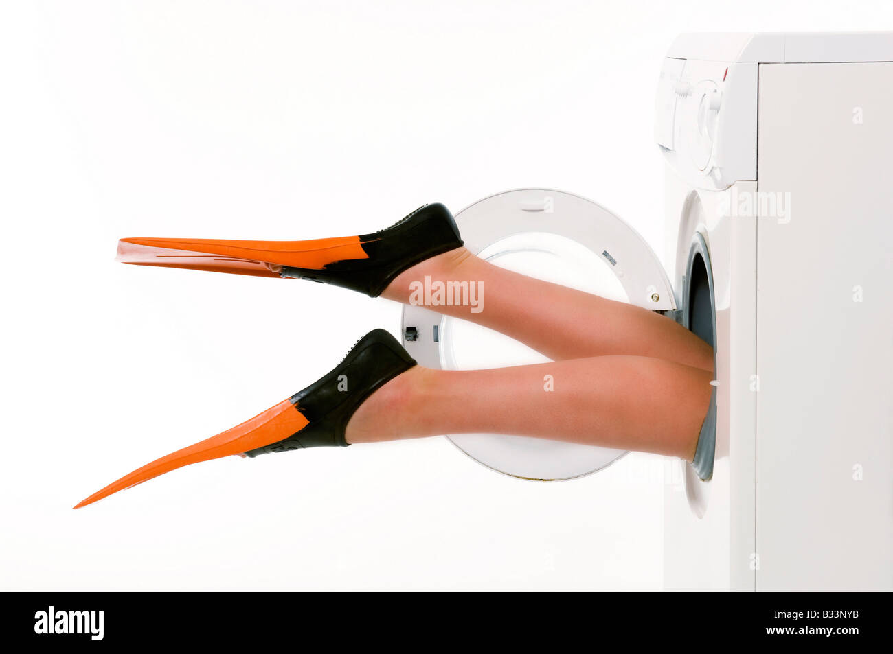 Caucasian legs wearing orange flippers disappearing through the door of ...