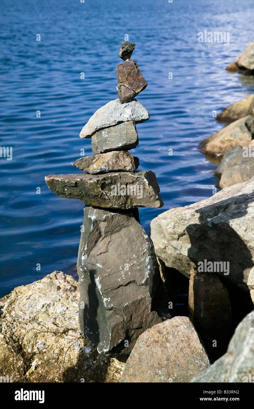 Group of balanced rocks by sea shore Stock Photo - Alamy