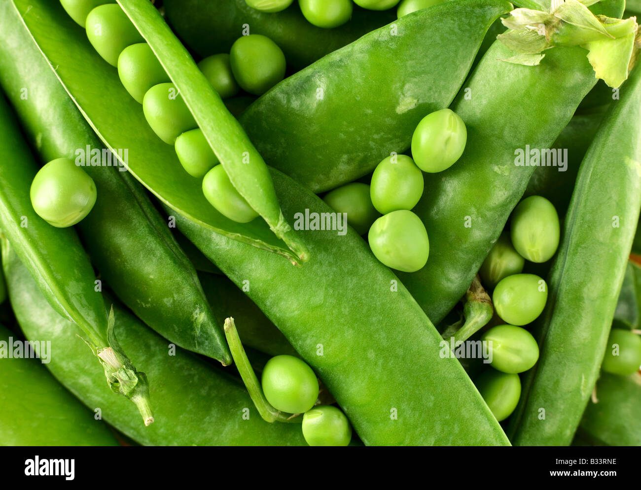 Green peas vegetable with seed closeup view Stock Photo - Alamy