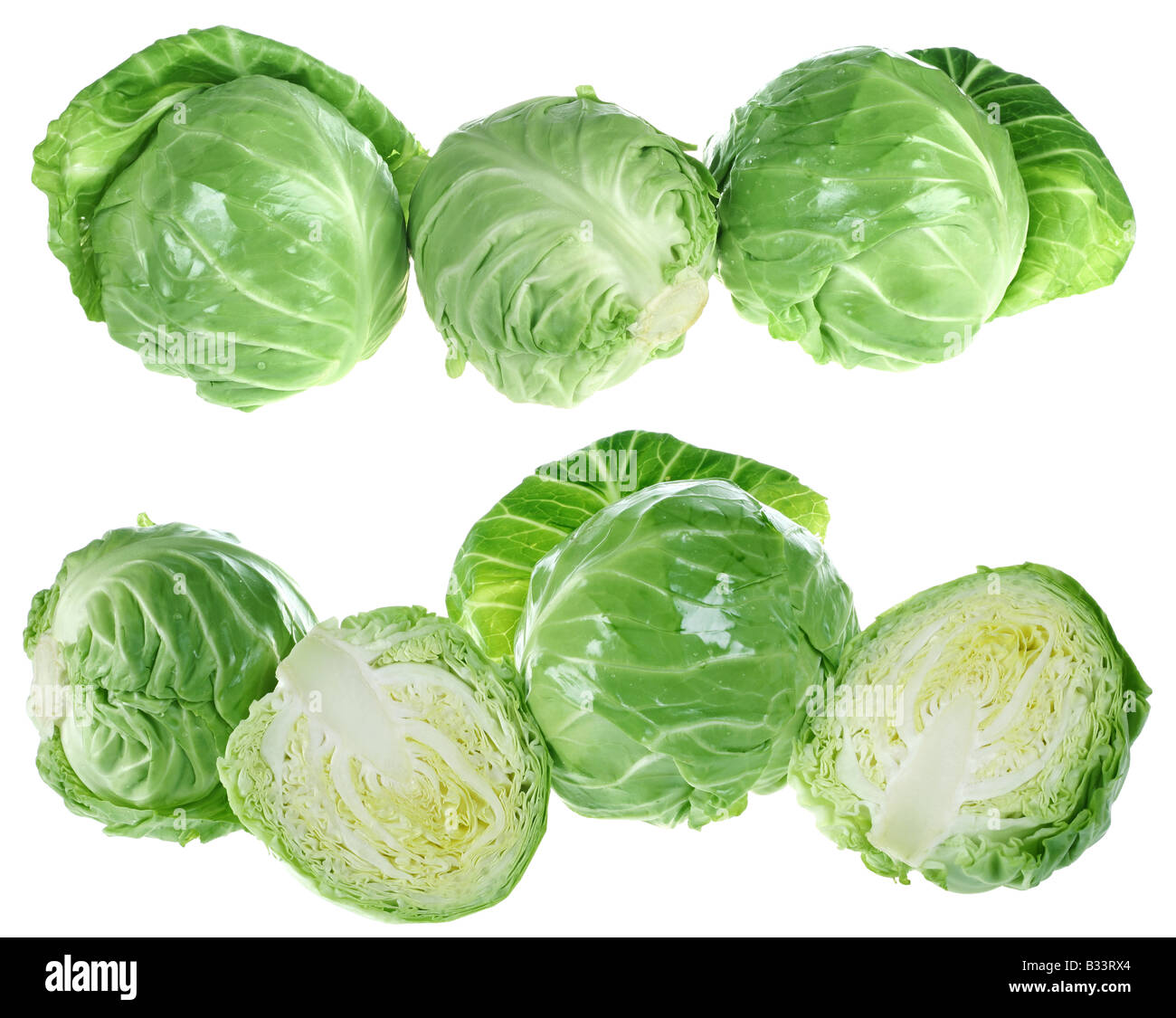 Young green cabbage isolated on white background Stock Photo - Alamy