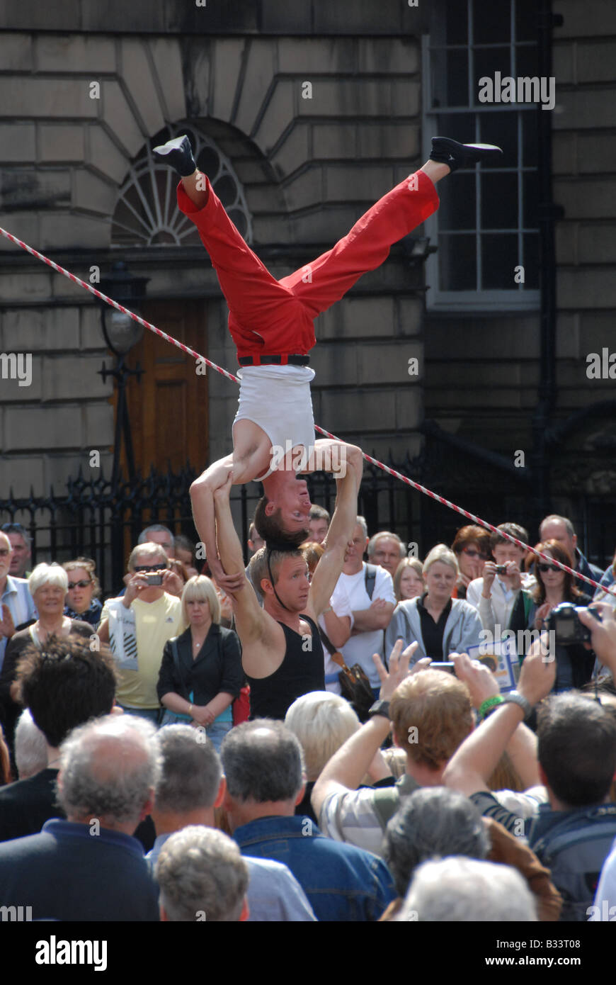 Acrobatic street performers Stock Photo - Alamy