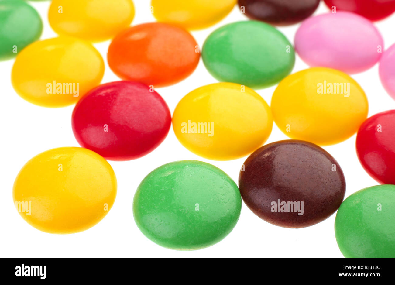 Color candy pill isolated on white background Stock Photo - Alamy