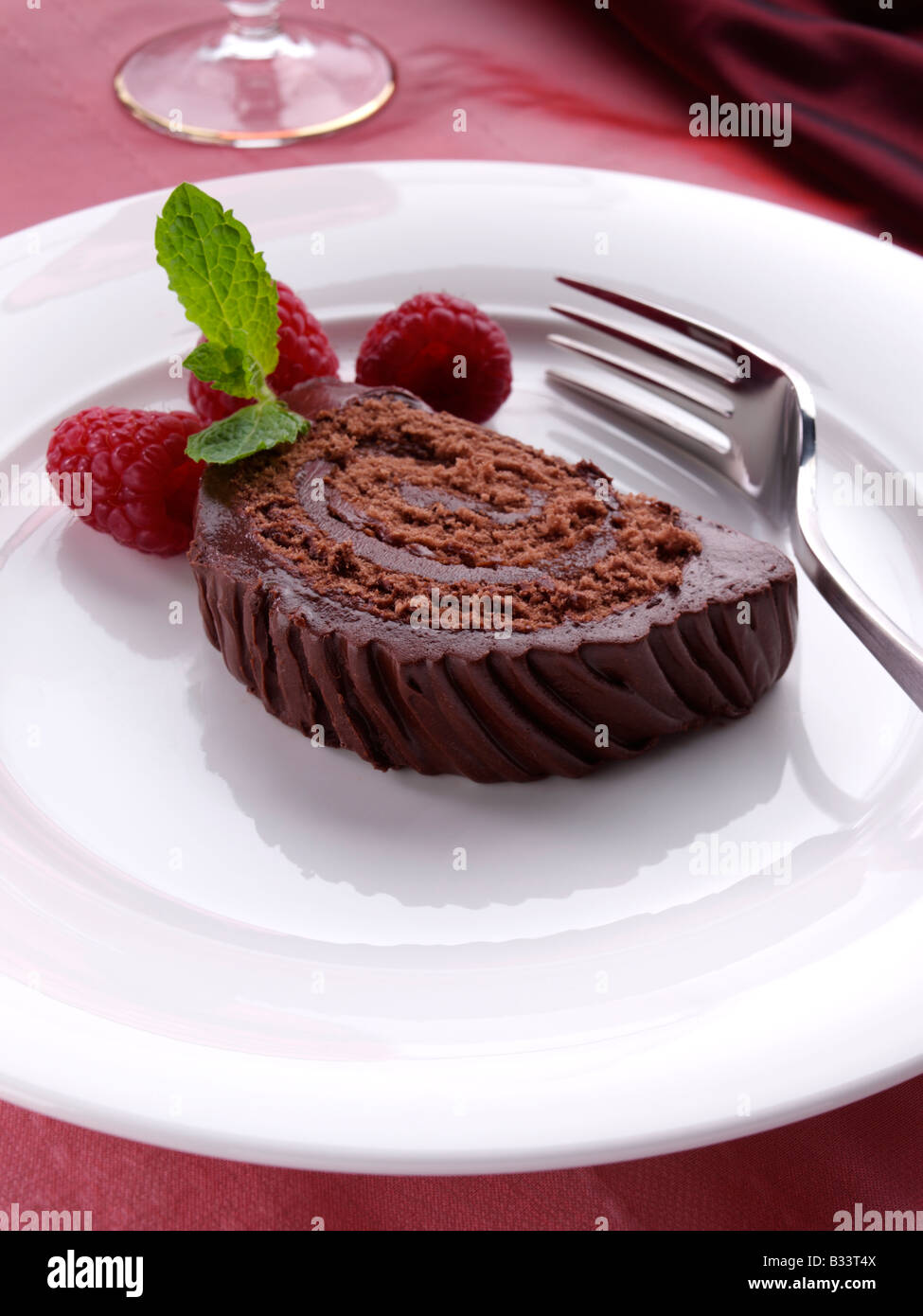 Frosted christmas chocolate log dessert hi-res stock photography and ...