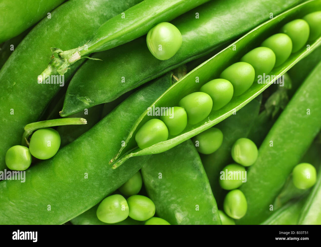 Green peas vegetable with seed closeup view Stock Photo - Alamy