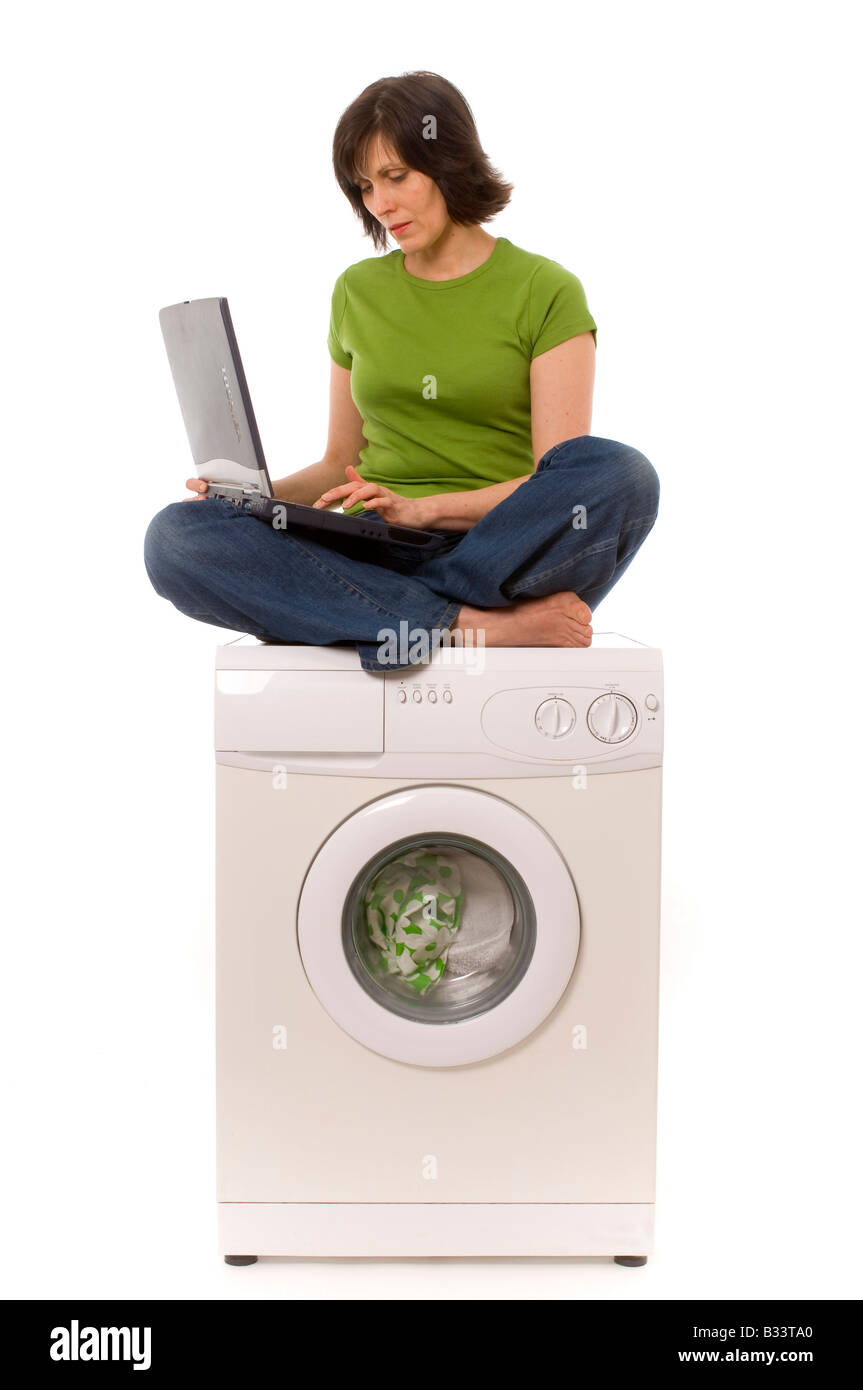 Woman washing machine cross hi-res stock photography and images - Alamy