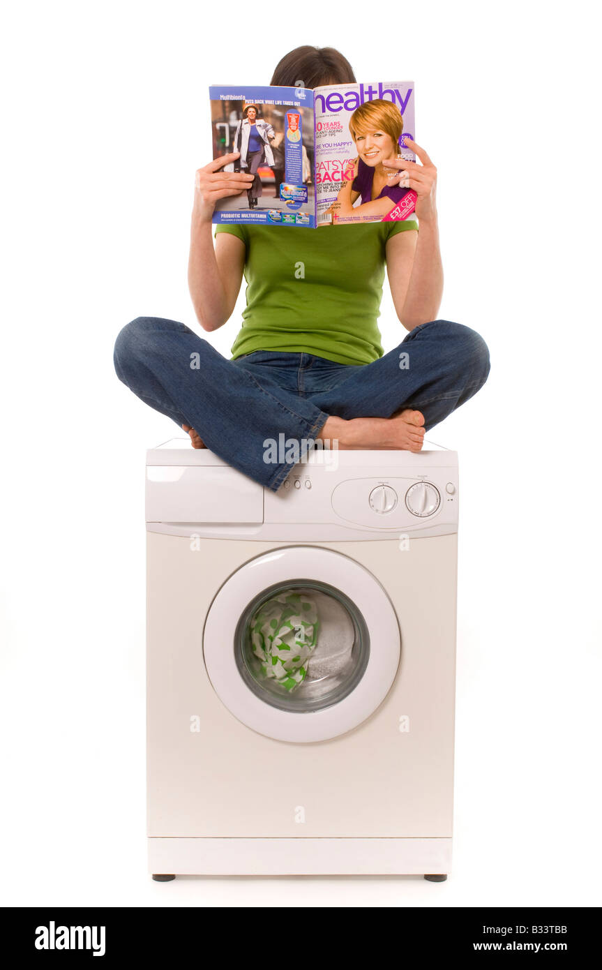 Woman washing machine cross hi-res stock photography and images - Alamy