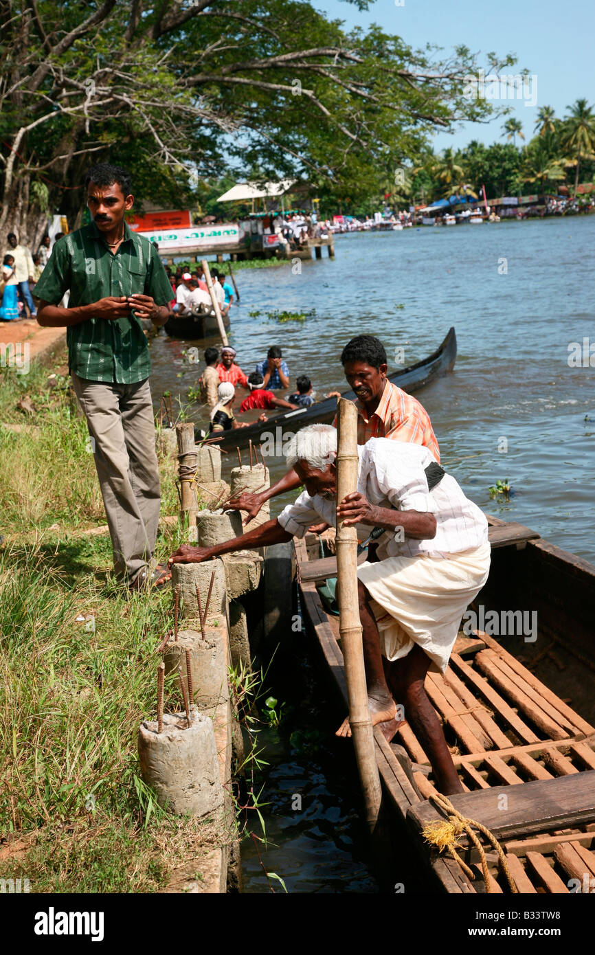 An oldman getting out of boat at Alleppey,Kerala,India Stock Photo - Alamy