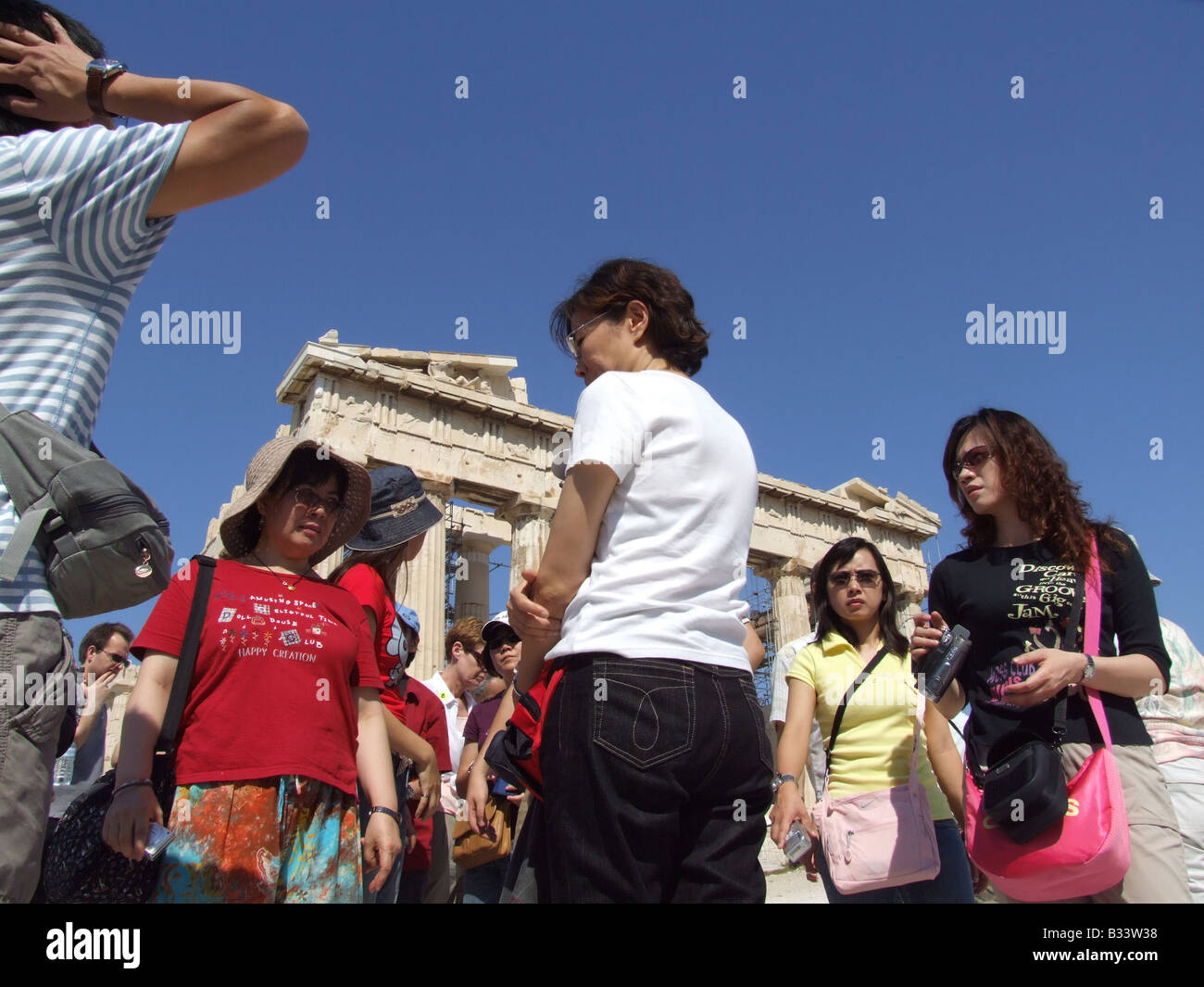 tourists by the parthenon in athens, greece Stock Photo - Alamy