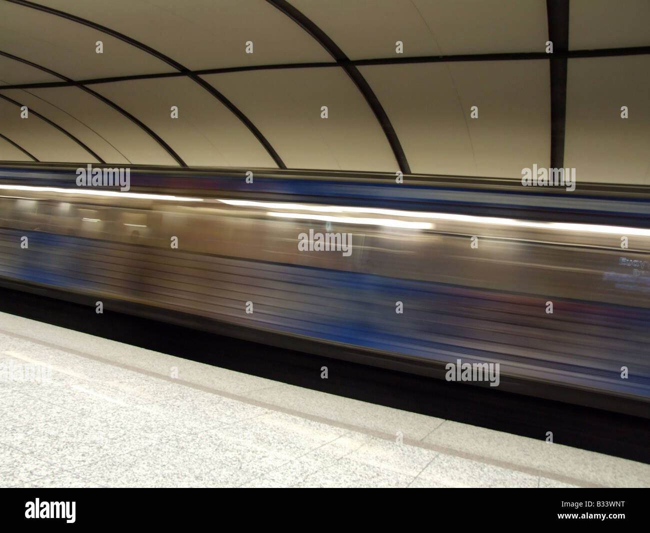 fast metro train in railway station in athens Stock Photo - Alamy