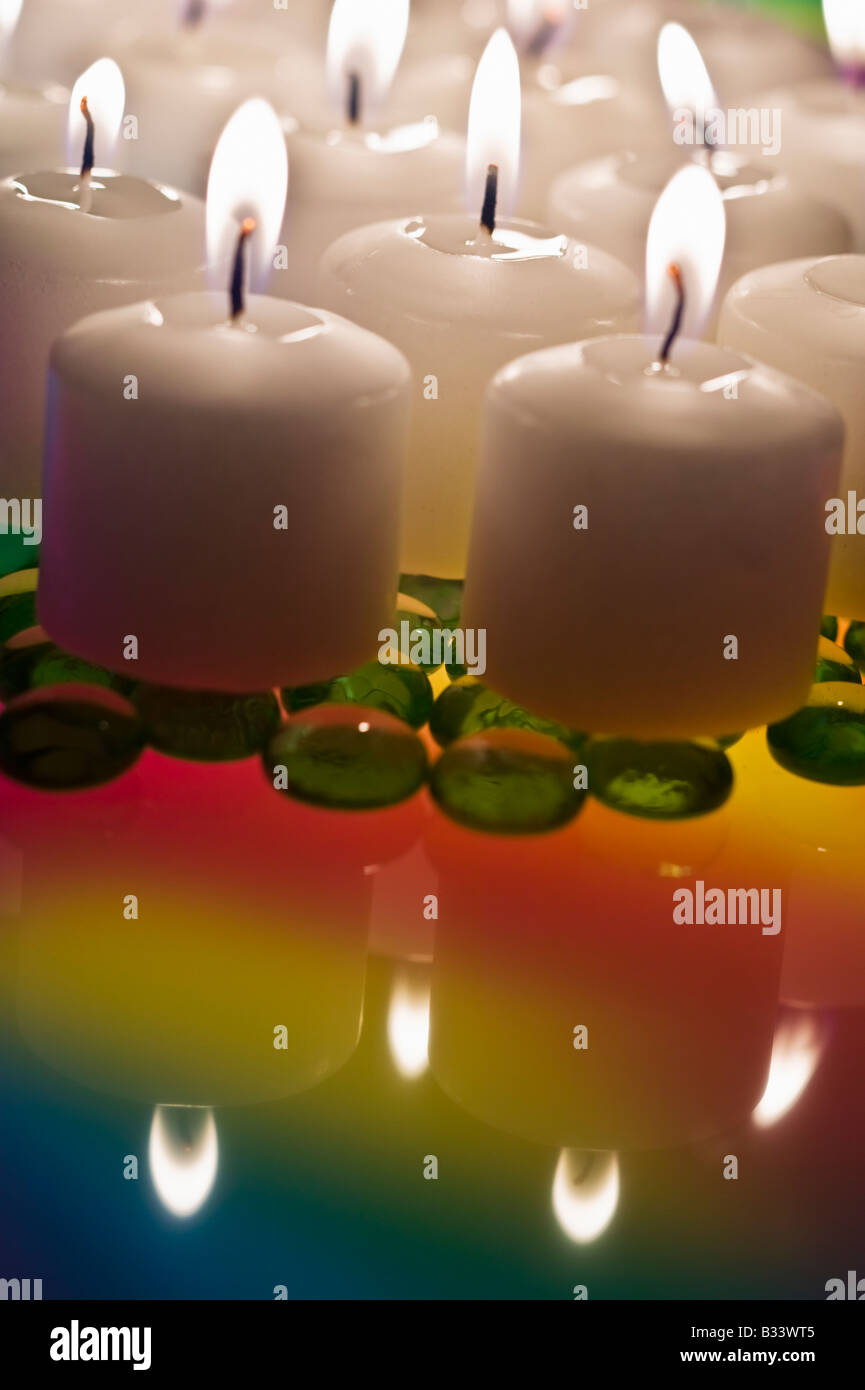 Many candles one candle lit hi-res stock photography and images - Alamy