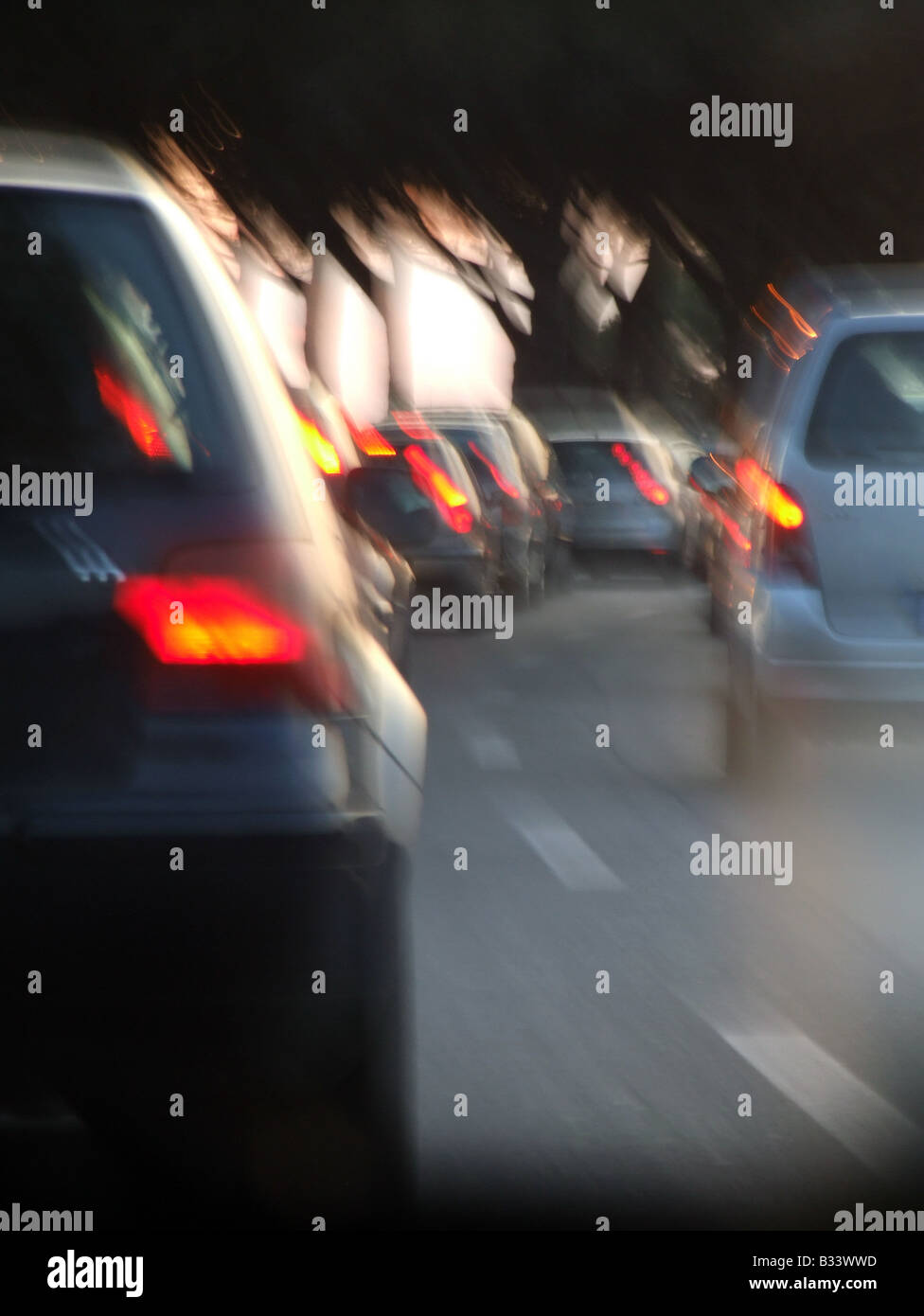 cars in traffic jam on road at sunset Stock Photo - Alamy