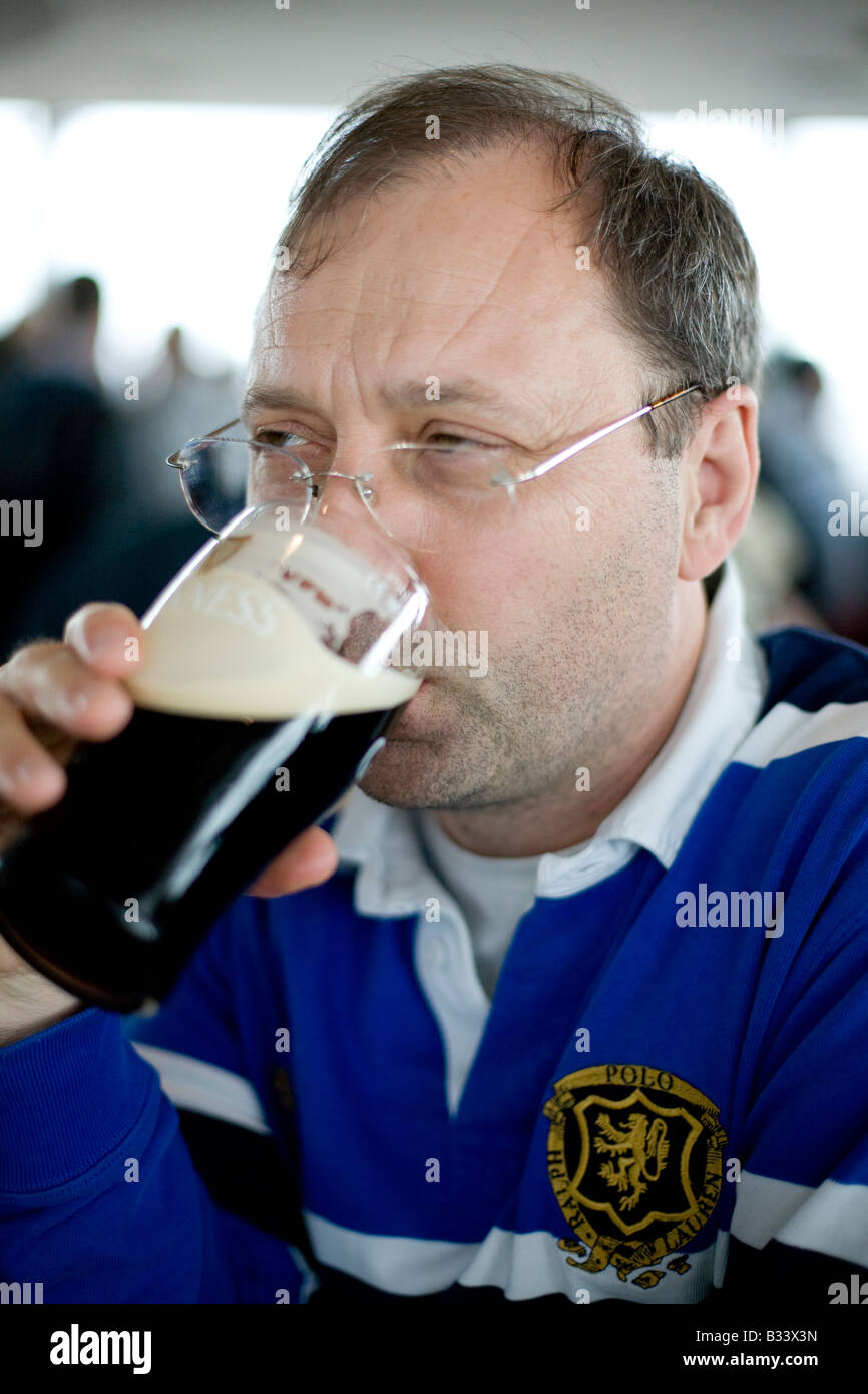 pint of Guinness being drunk by man in circular Gravity Bar atop the ...