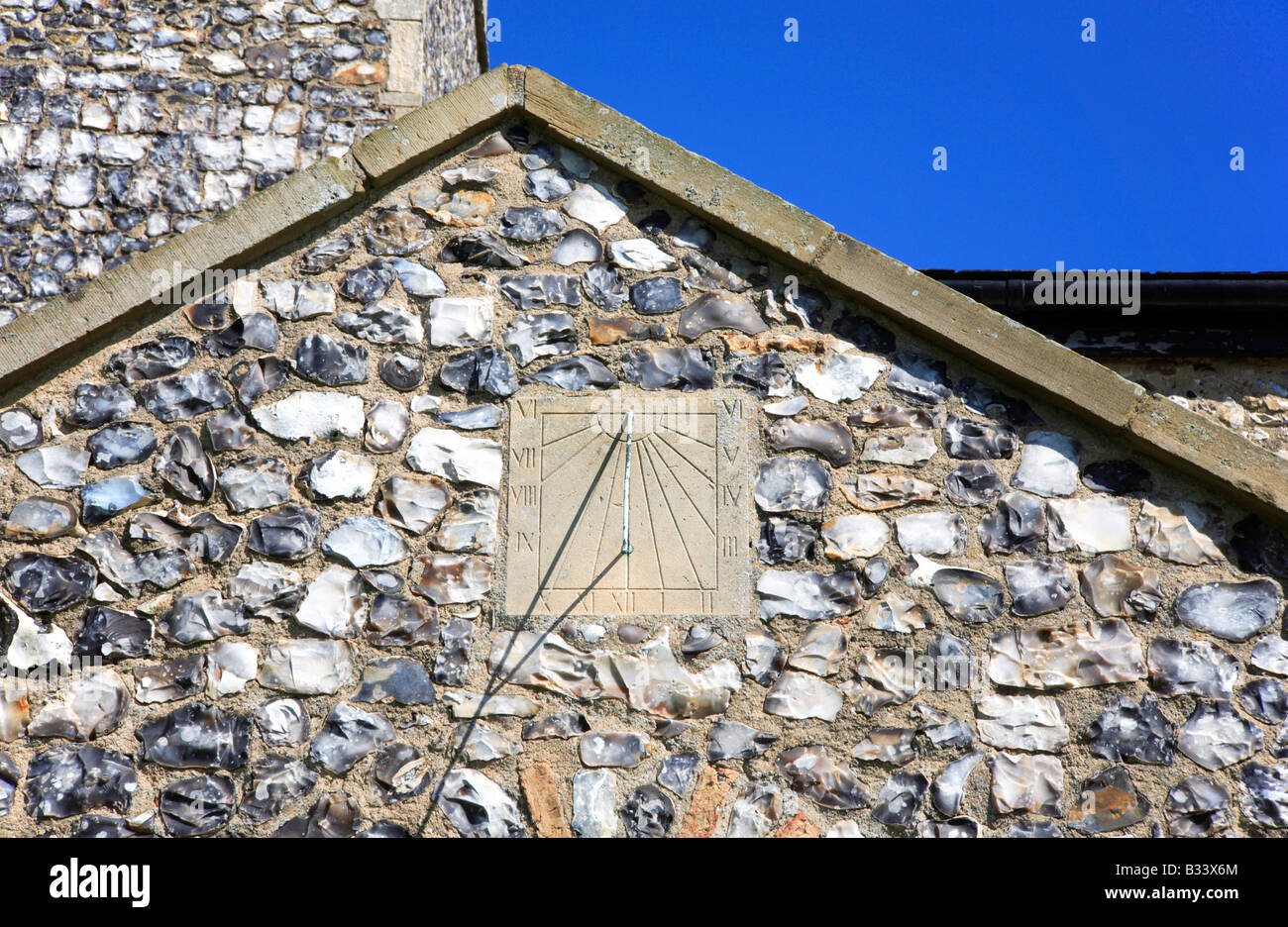 Sundial above the South Porch entrance at the Church of All Saints at ...