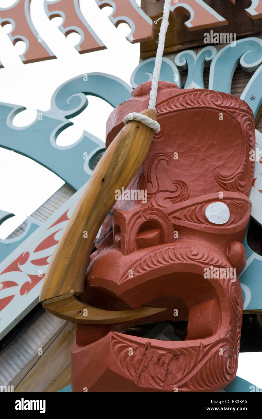 Maori carving of fish swallowing hook at Kaikoura Stock Photo - Alamy