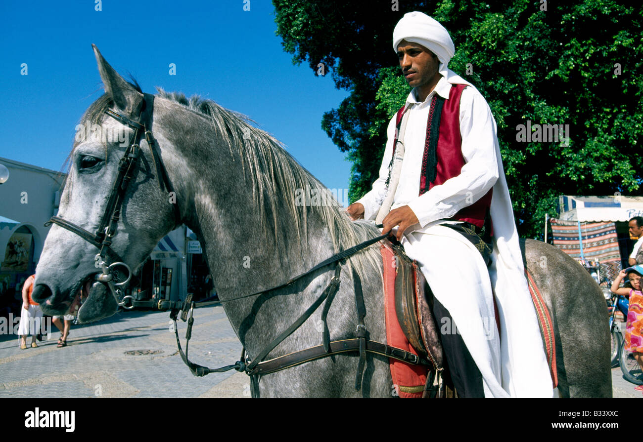 Rider wearing a traditional costume in Midoun Djerba Island Tunisia ...