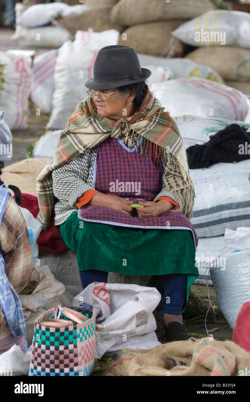 Woman in black hats and poncho,Guamote market, indian farmer andes ...