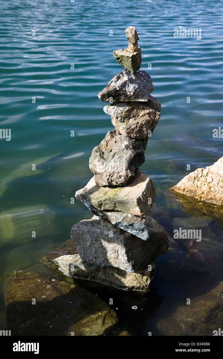 Group of balanced rocks by sea shore Stock Photo - Alamy