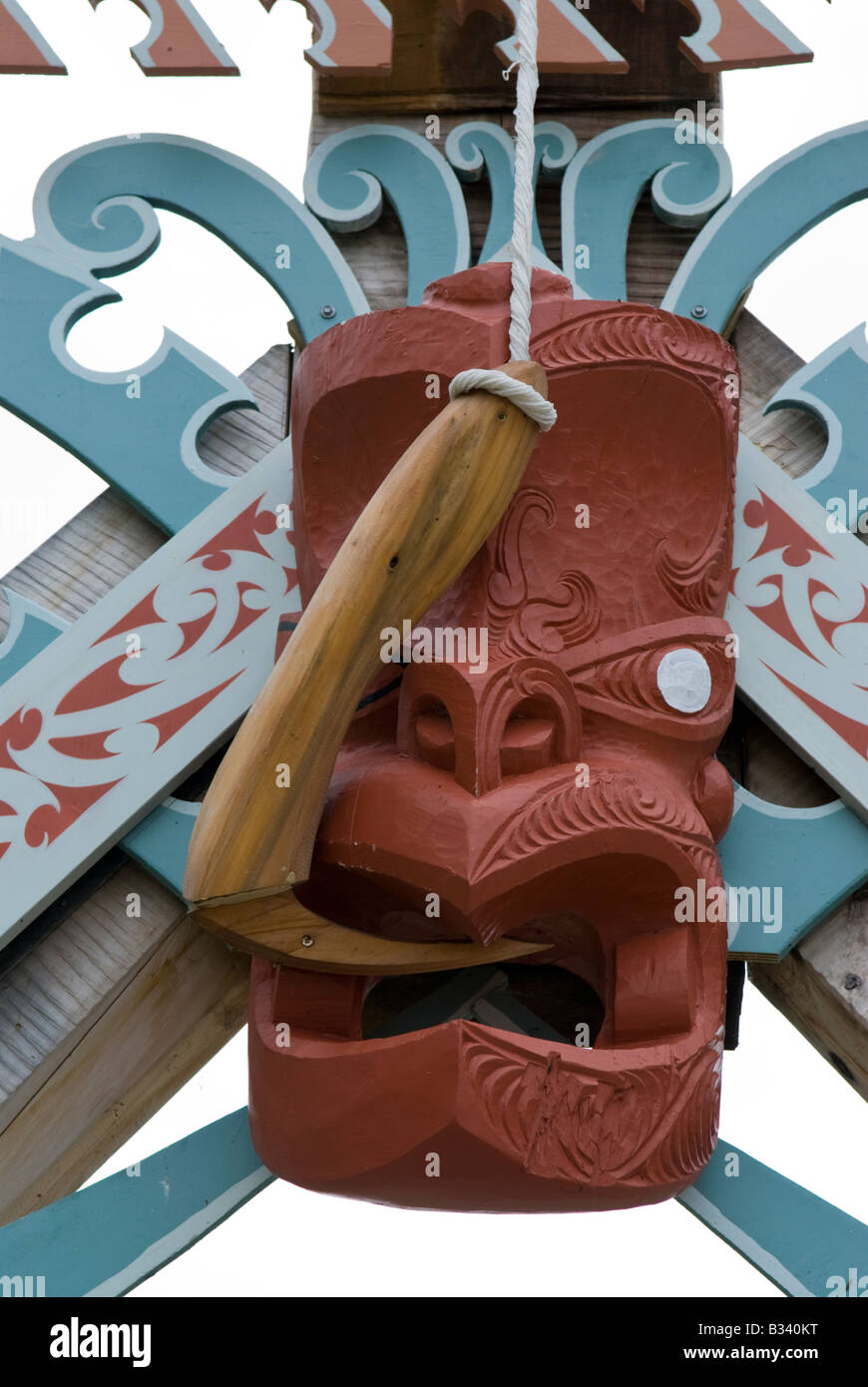 Maori carving of fish swallowing hook at Kaikoura Stock Photo - Alamy