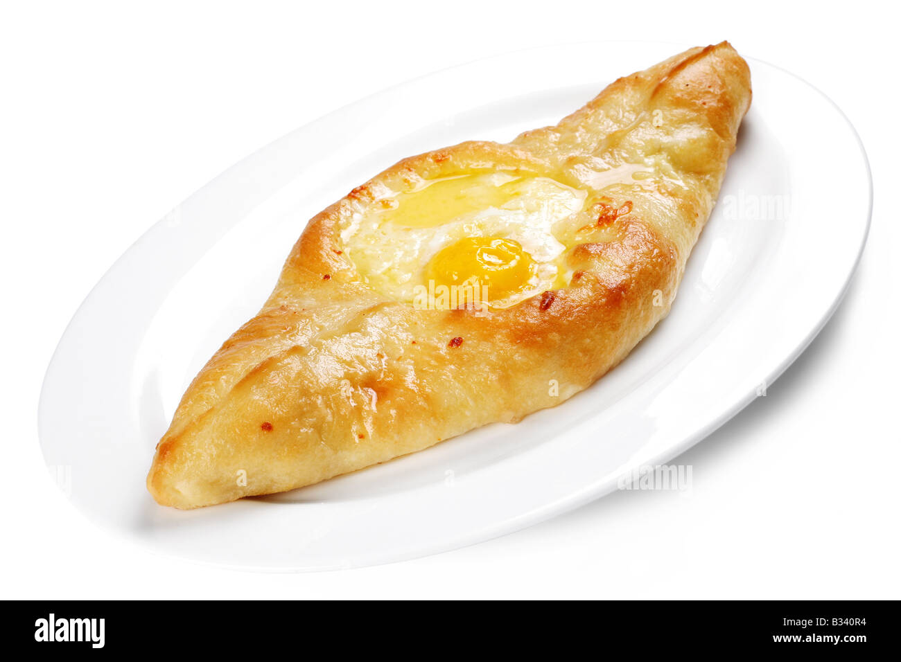 Georgian national food fried bread with egg and cheese Stock Photo - Alamy