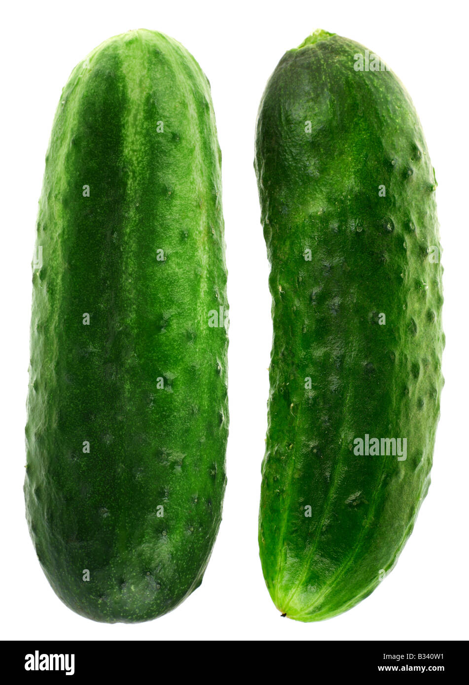Green cucumber group isolated on white background Stock Photo - Alamy