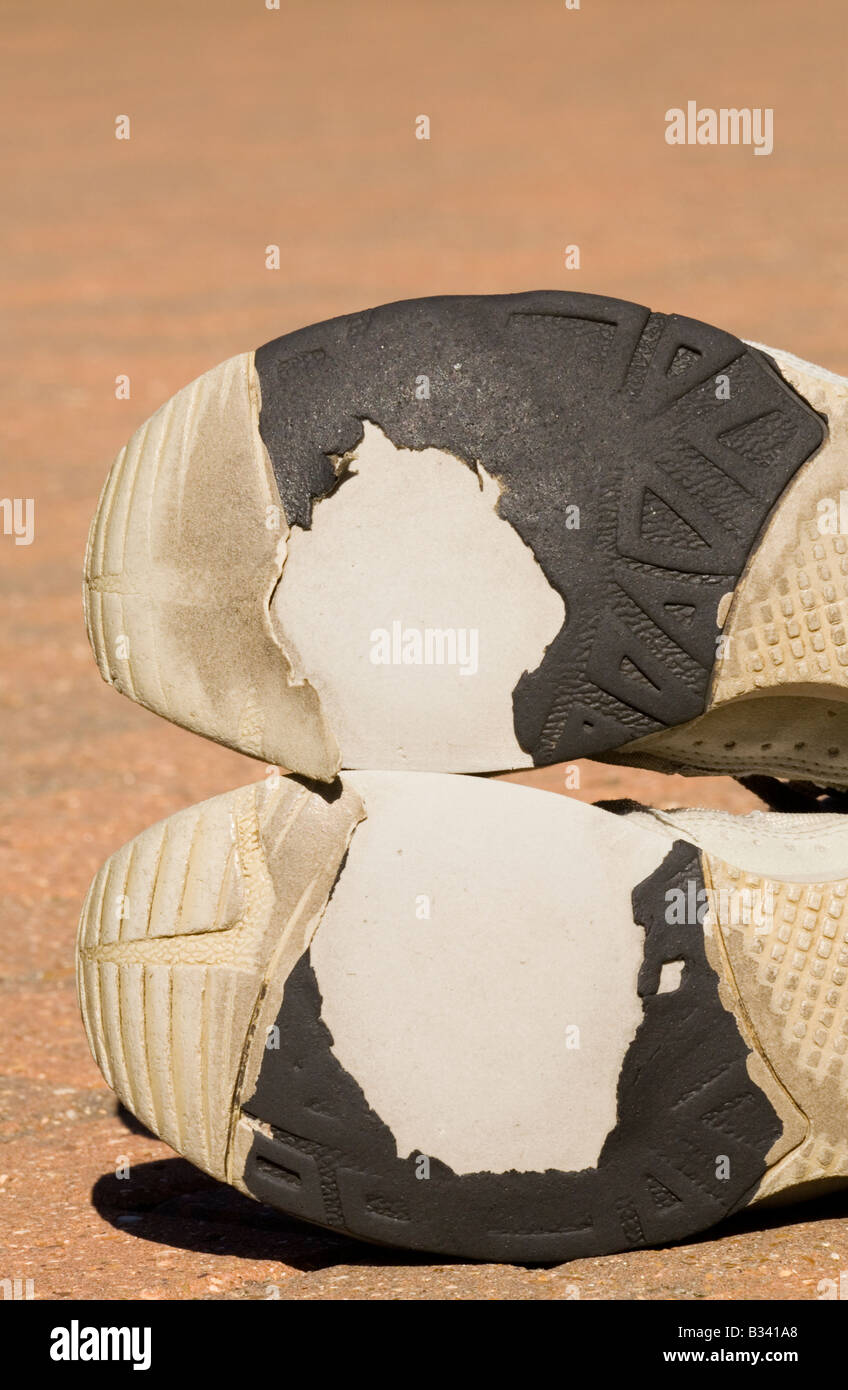 Worn out pair of shoes hi-res stock photography and images - Alamy