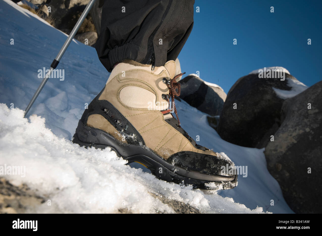 Hiking boot in the snow Stock Photo - Alamy