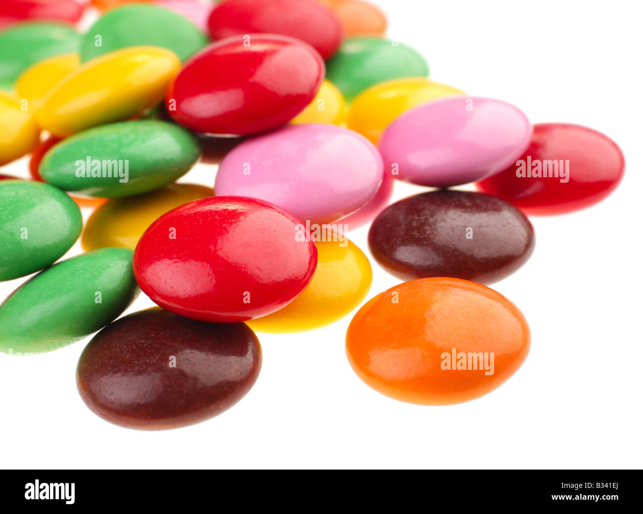 Color candy pill isolated on white background Stock Photo - Alamy
