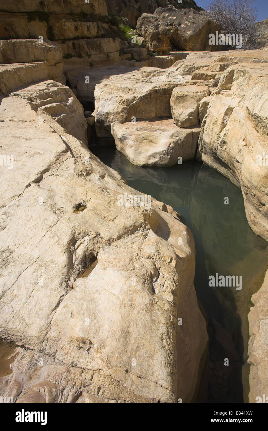A mountain stream in a white marble channel in southern mountains Stock ...