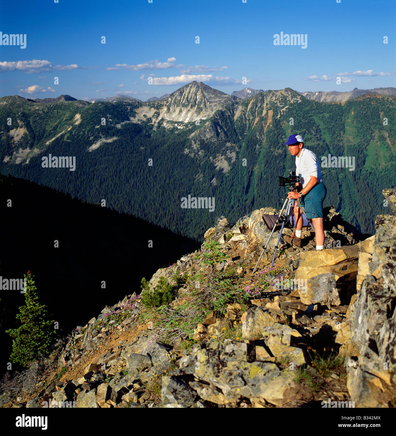 Photographer on Tamarack Peak (7290'), Pasayten Wilderness; Pacific ...
