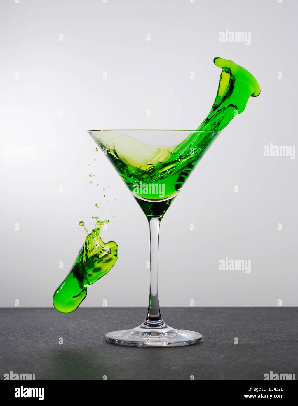 High-speed cocktail glass splash Stock Photo - Alamy