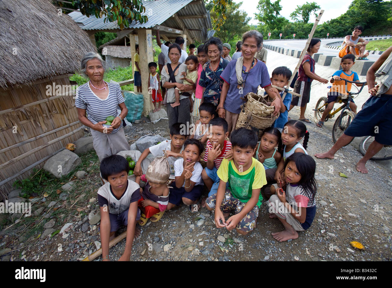 Mangyans wait at a bus stop near Mansalay, Oriental Mindoro ...