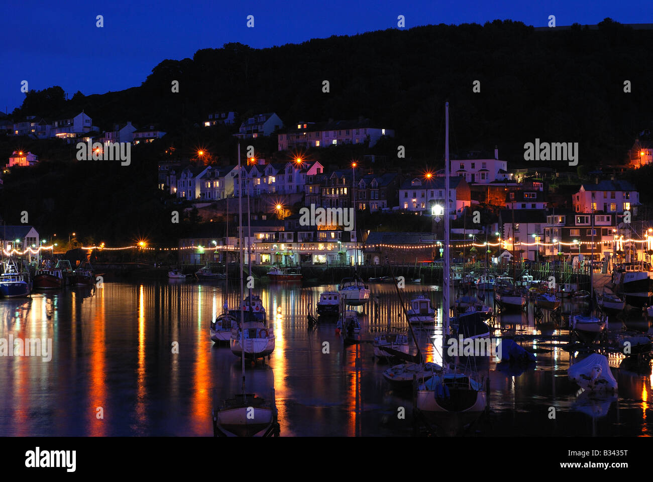 Looe harbour by night Stock Photo - Alamy