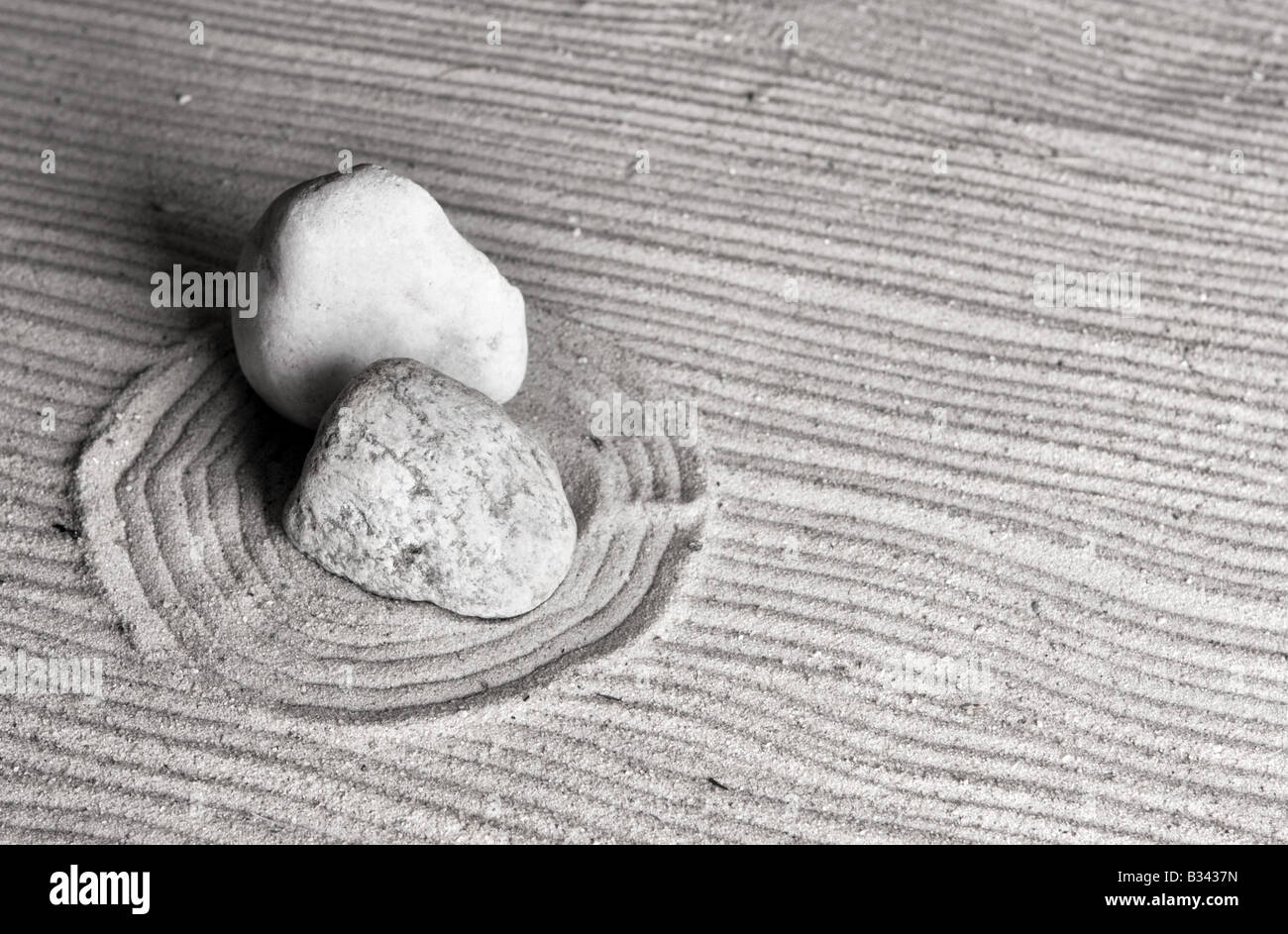 Two rocks in a traditional japanese garden of stones Stock Photo - Alamy
